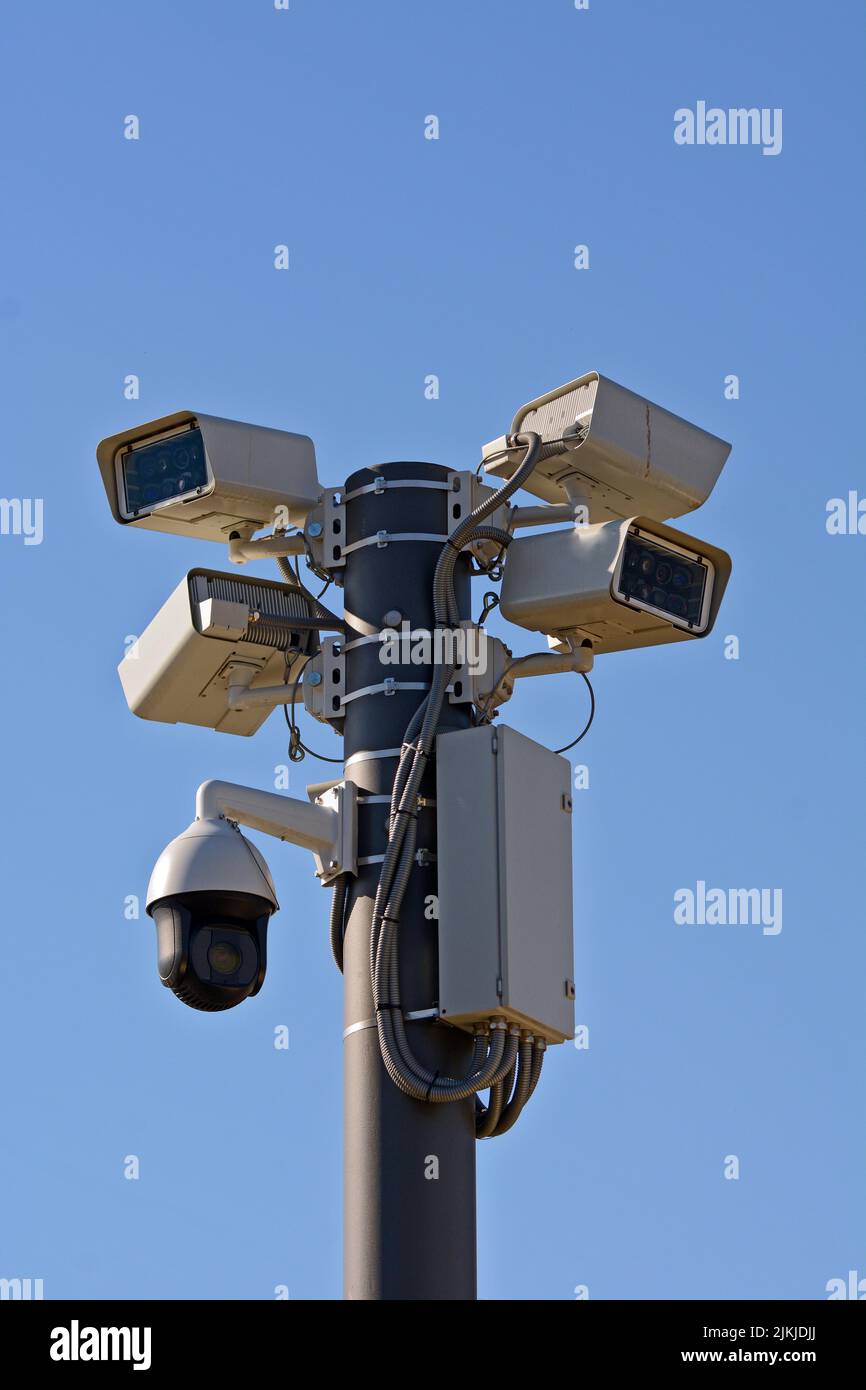 A modern CCTV camera in the public. Surveillance technology Stock Photo ...