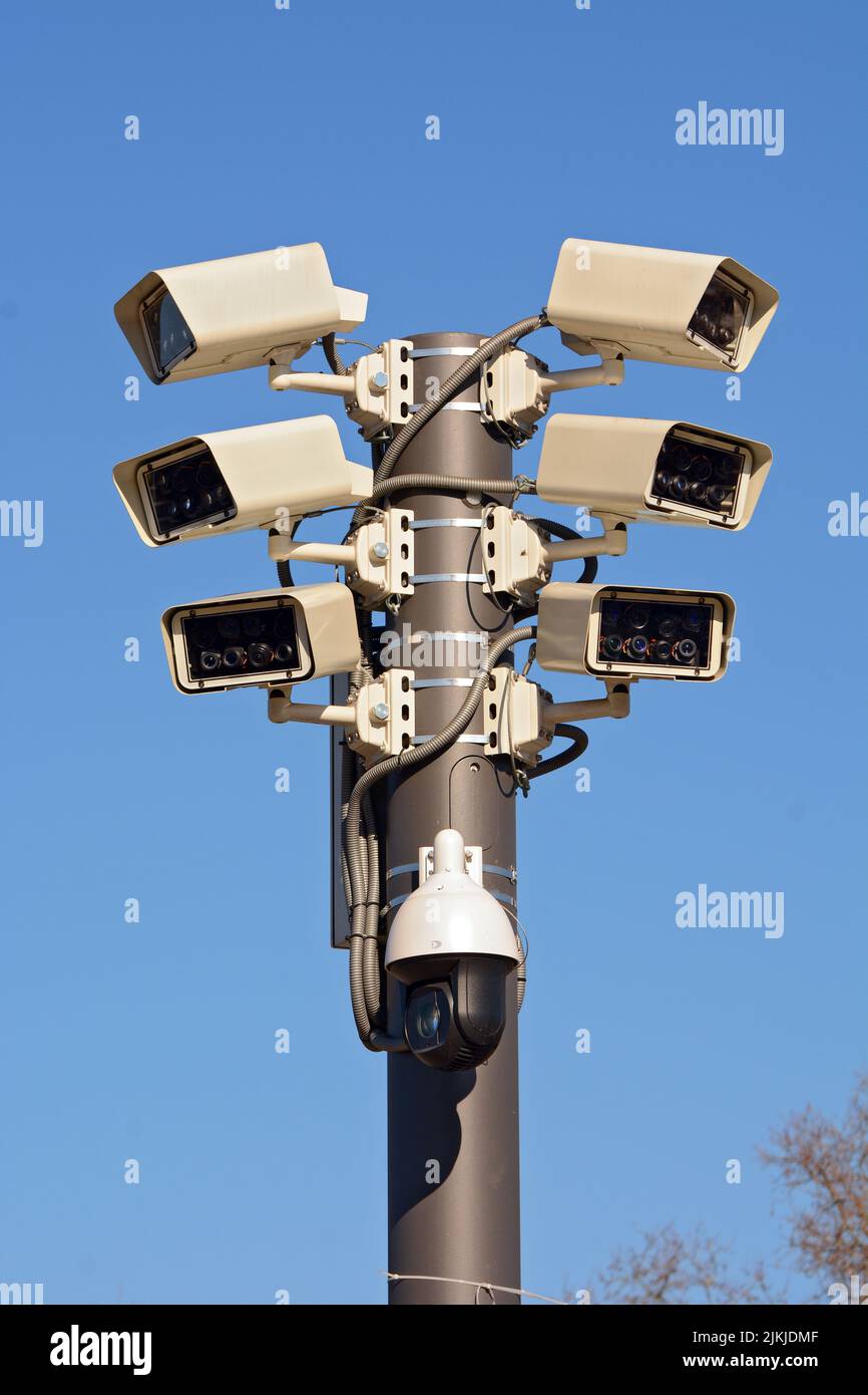 A modern CCTV camera in the public. Surveillance technology Stock Photo ...