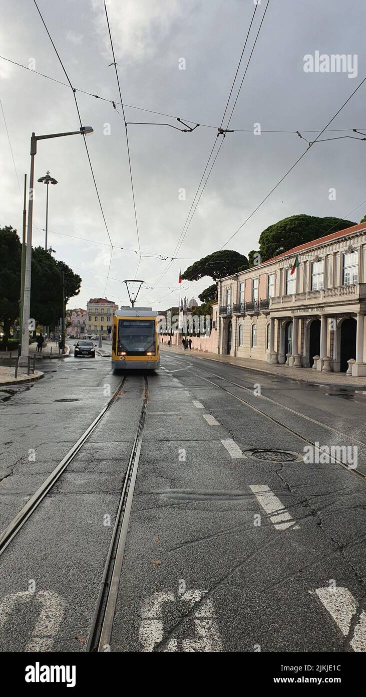 A beautiful view of a tram on a rail under the cloudy sky Stock Photo ...