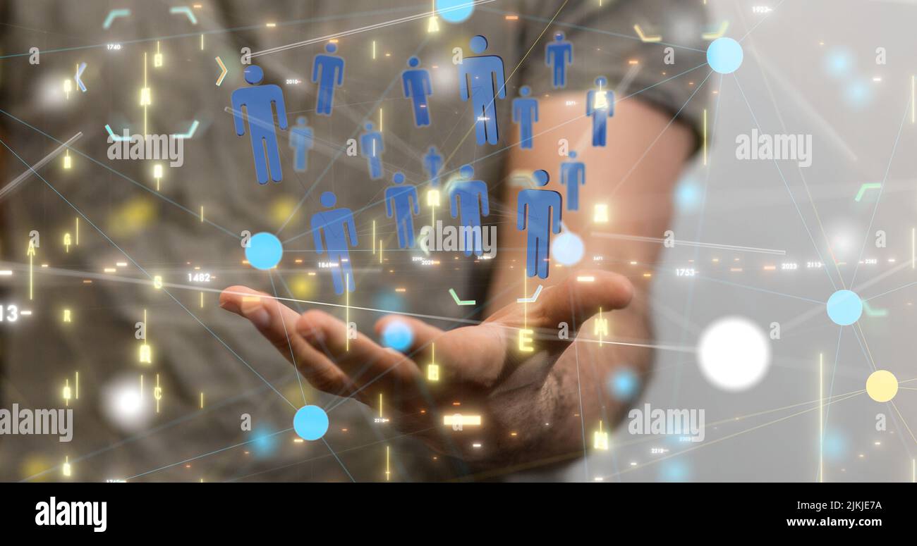 A hologram of interconnected people and binary code on a businessman's ...
