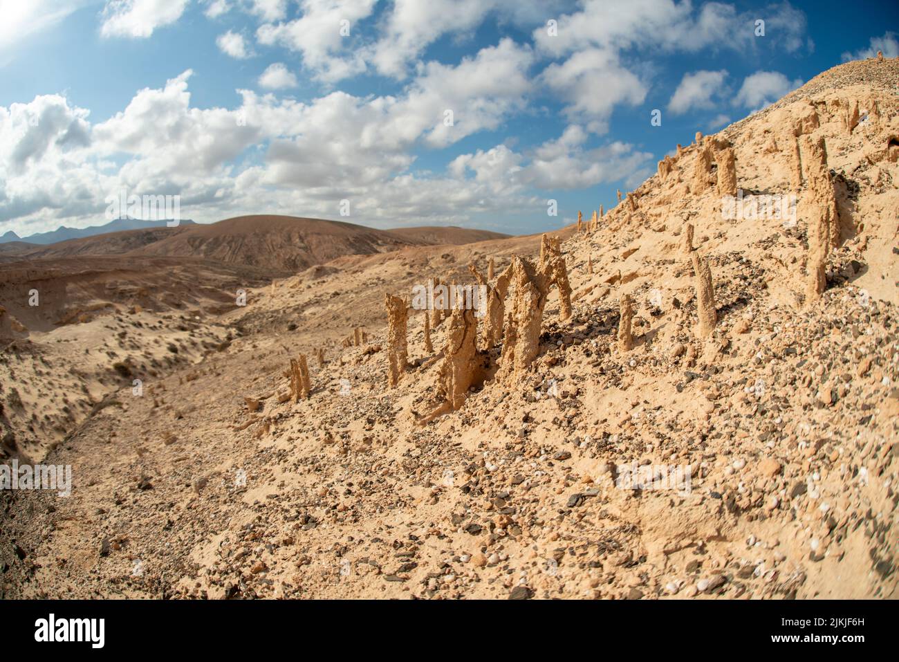 A hill of desert with unique rock formations Stock Photo - Alamy