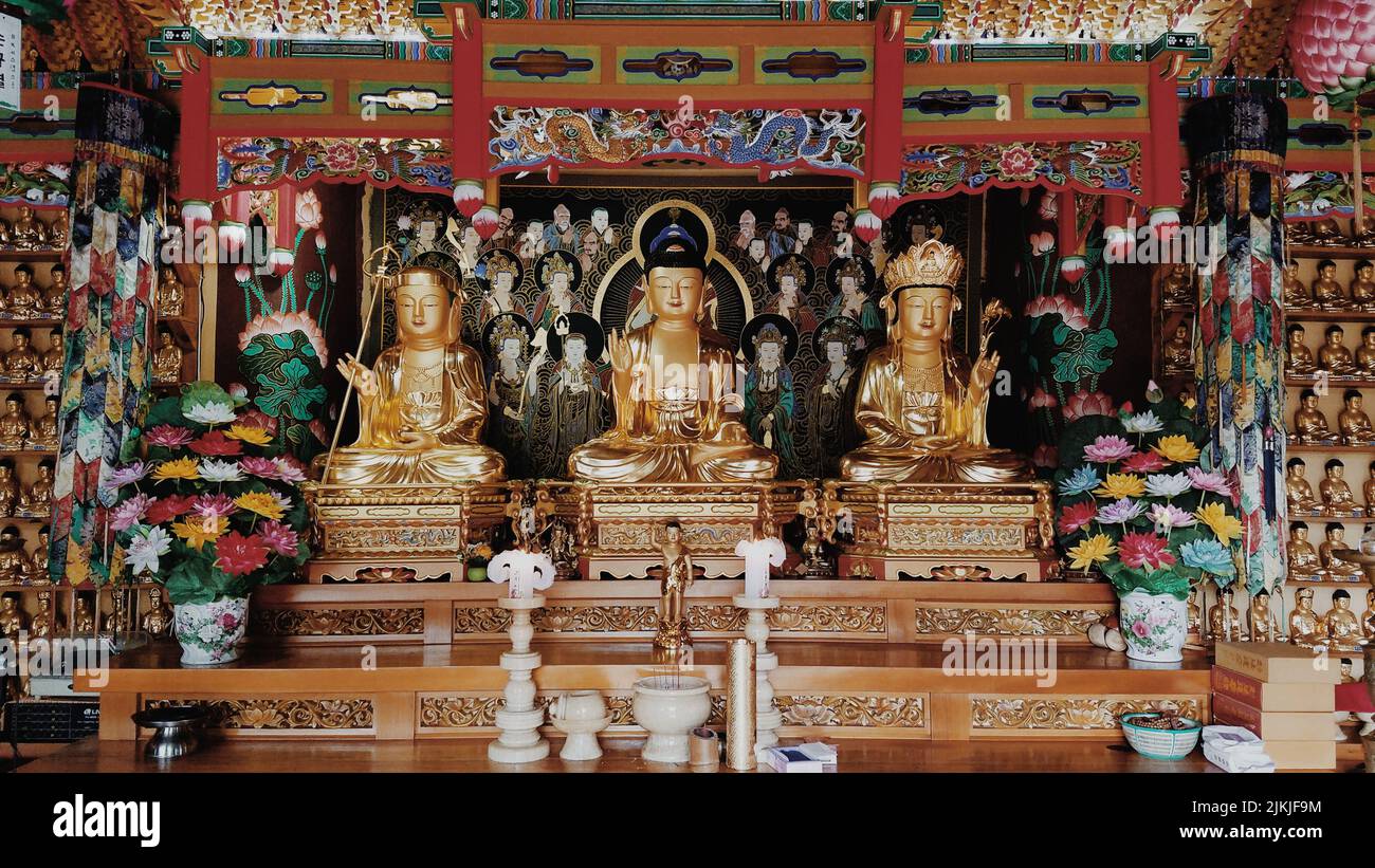 The small sculptures and statues with colorful decorations in the ...