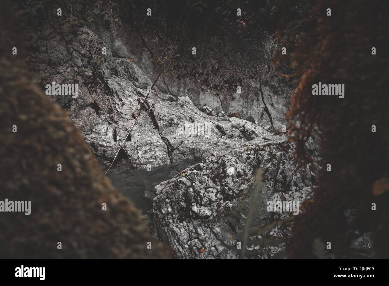 A view of the small river flowing through the rocks in Austria Stock ...