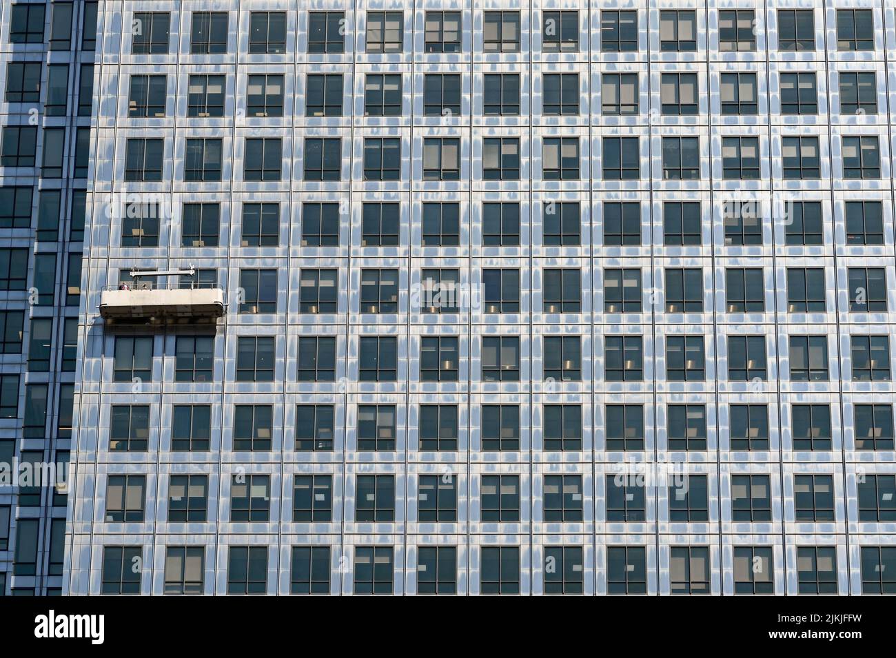 London, England - June 2022: Window cleaning cradle on the outside of ...