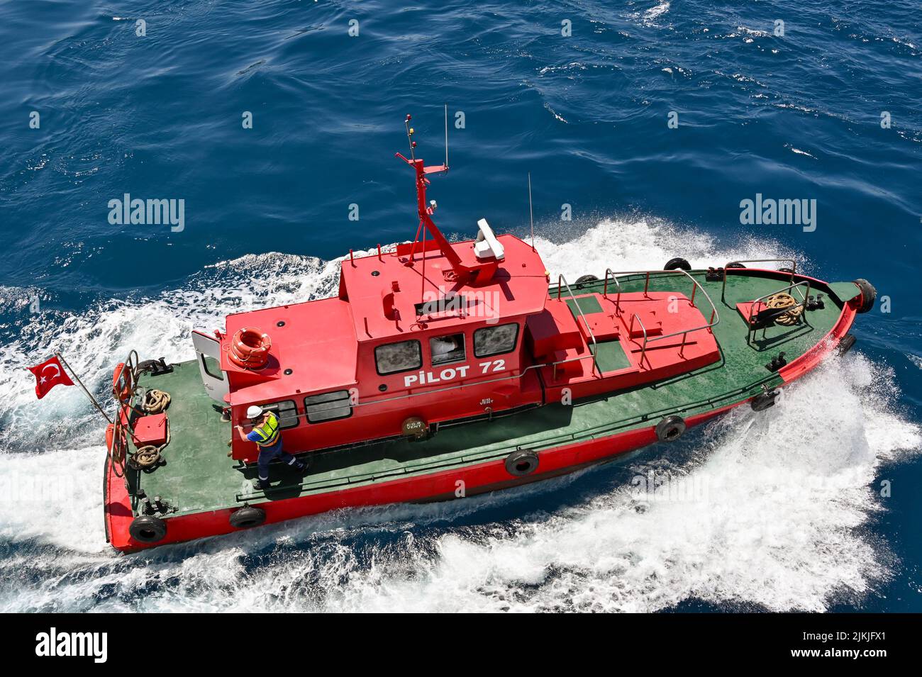 Kusadasi, Turkey - May 2022: Aerial view of a pilot boat leaving a ...