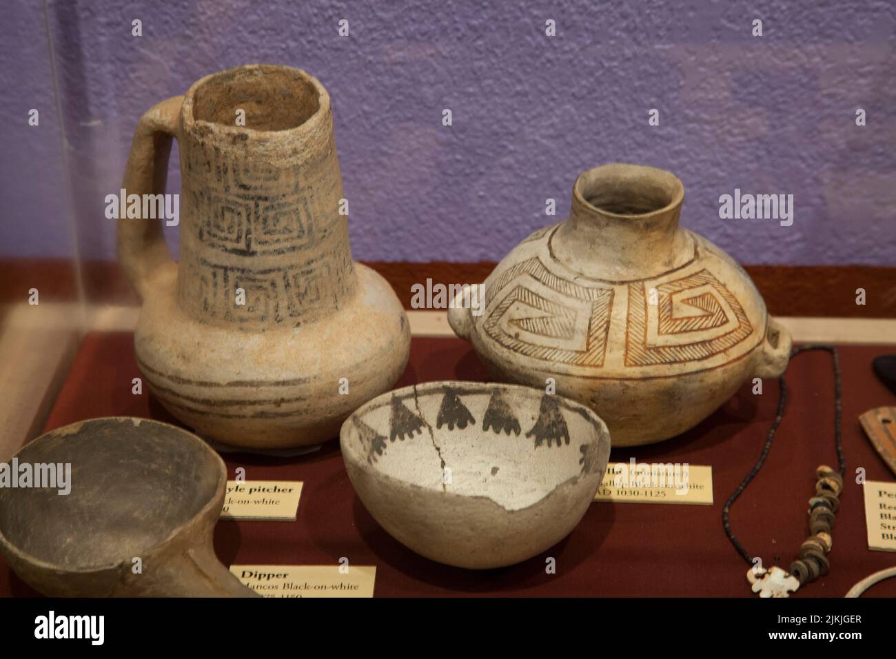 Assortment of Anasazi pottery such as a pitcher, canteen, bowl and ...