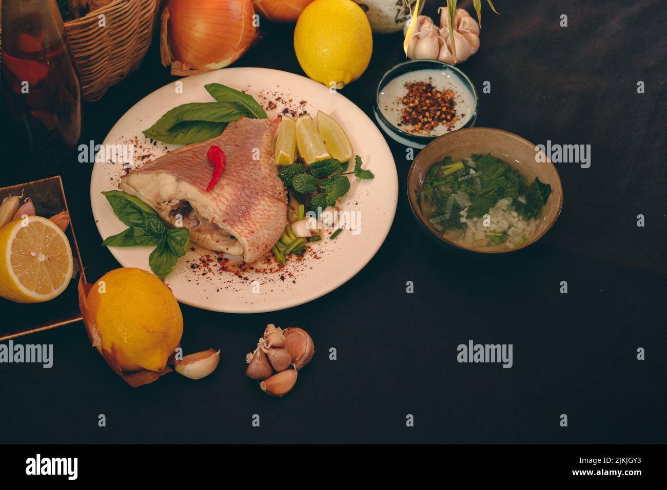 Traditional Khmer food, Sngor chruak sach trei or Sour fish soup Stock ...