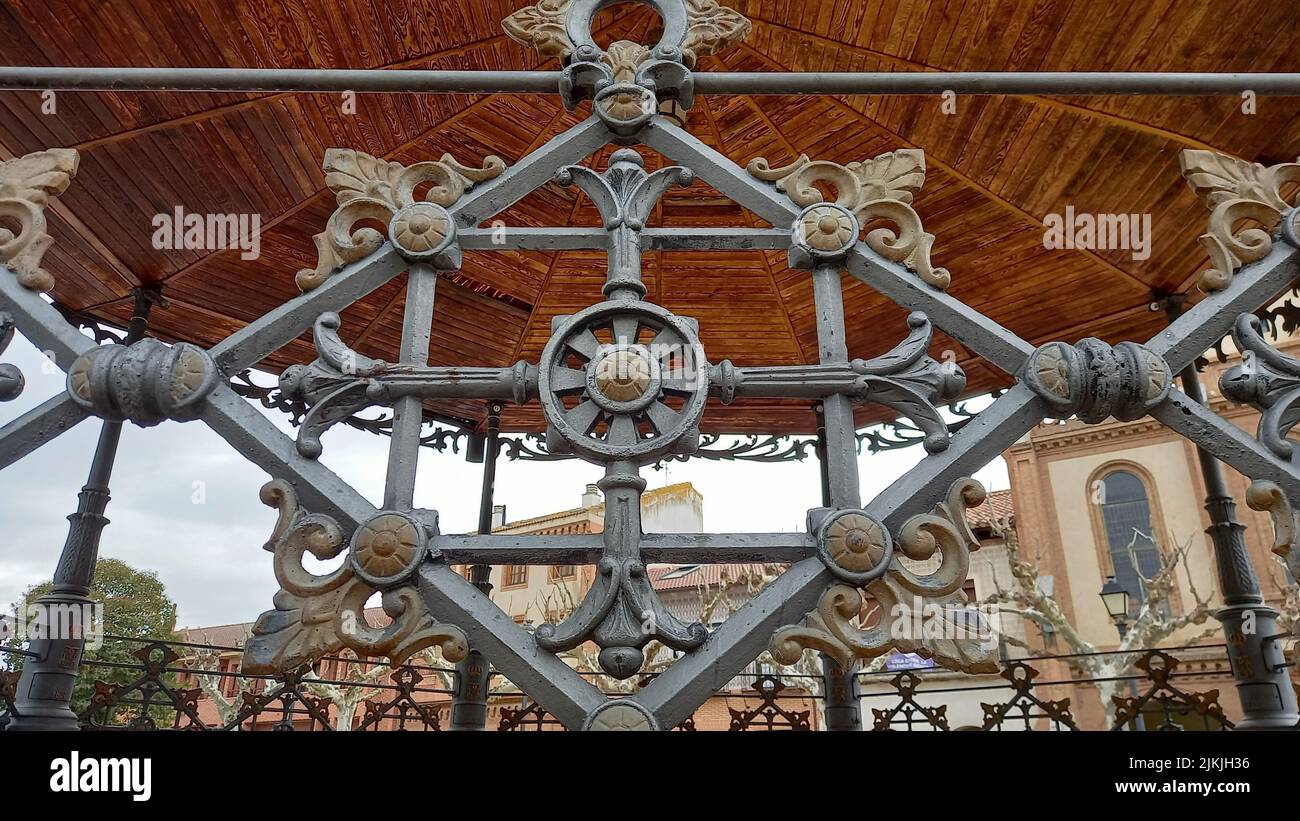 A closeup of a iron gate with a cross on it Stock Photo - Alamy