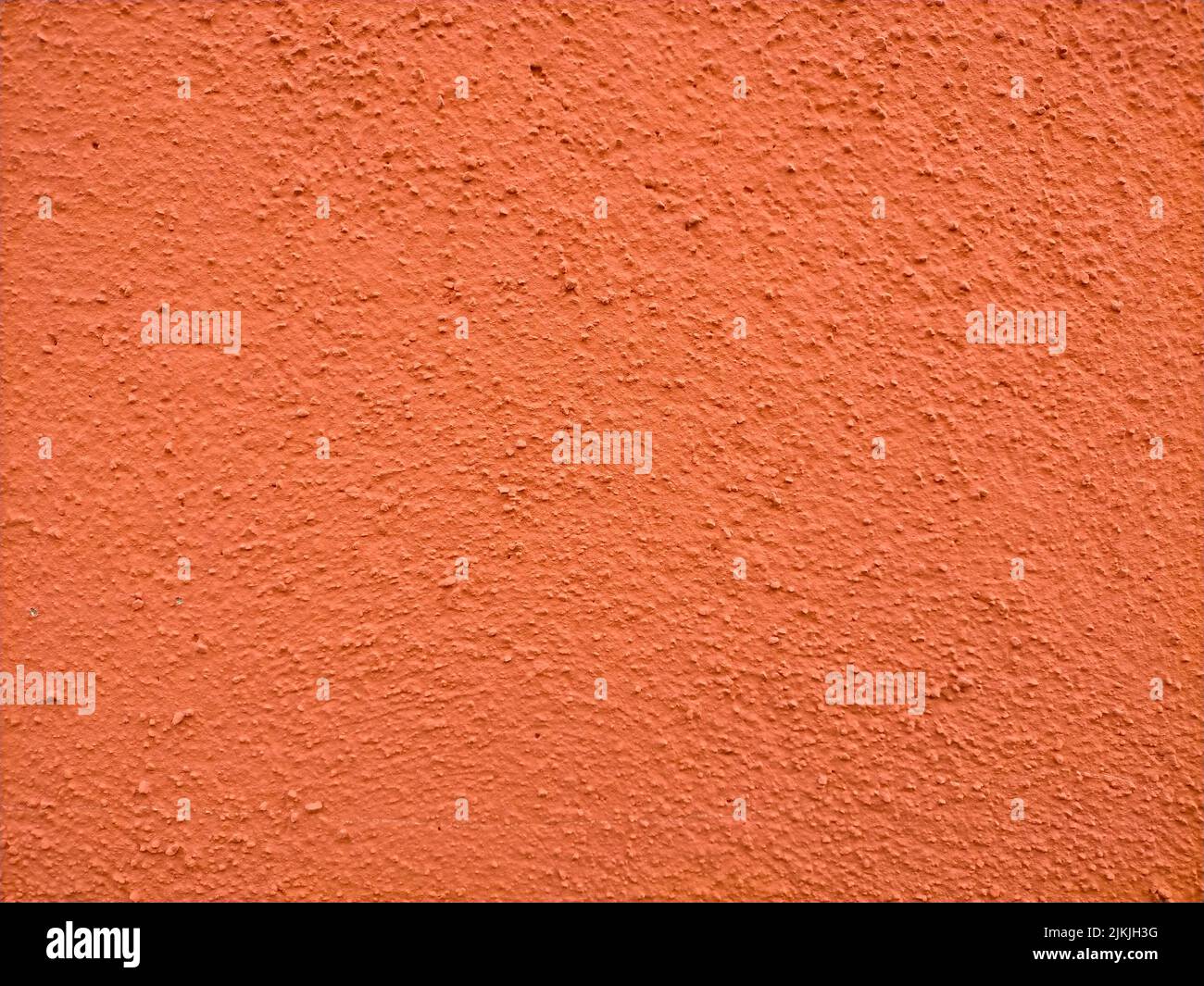 A orange painted stone wall texture with copy space Stock Photo - Alamy