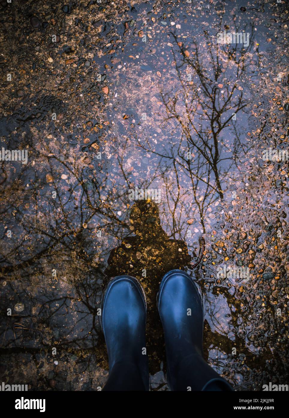 Young woman wearing boots hi-res stock photography and images - Alamy