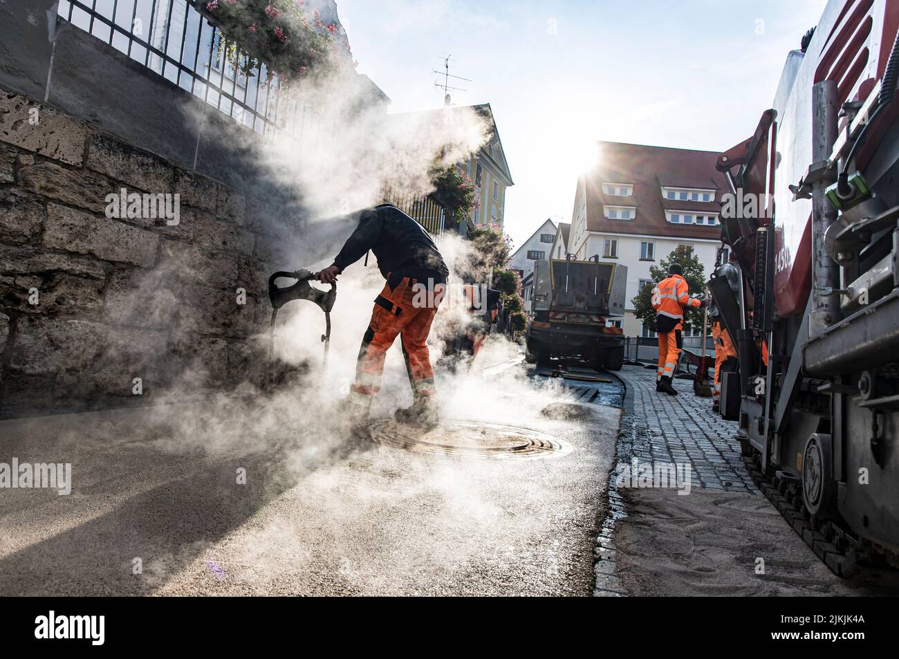 Asphalting with colored asphalt, construction site, construction of a ...