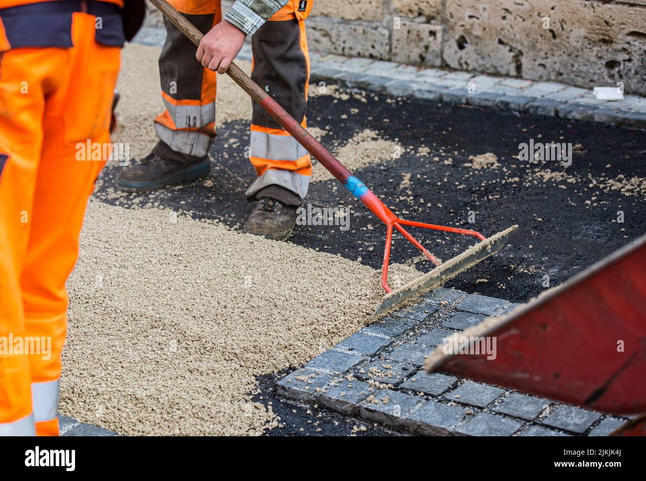 Asphalting with colored asphalt, construction site, construction of a ...