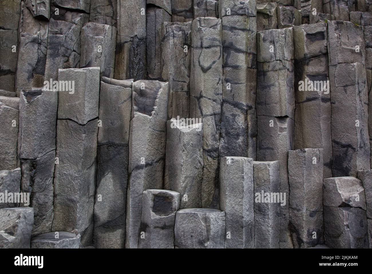 A closeup of black basalt columns. Geology Stock Photo - Alamy