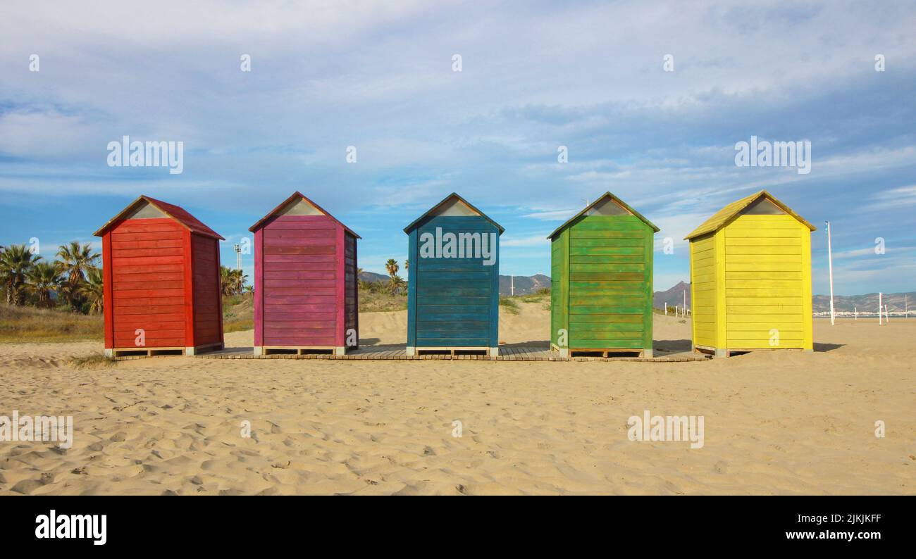 Colorful huts on the beach Stock Photo - Alamy