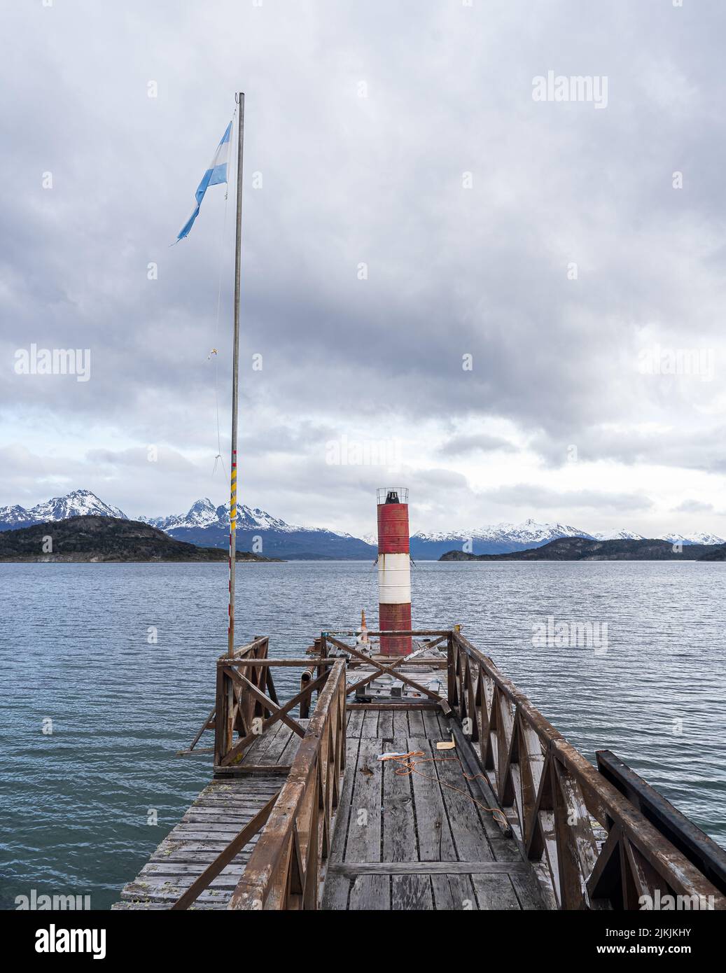 a vertical shot of small lighthouse on pier Stock Photo - Alamy