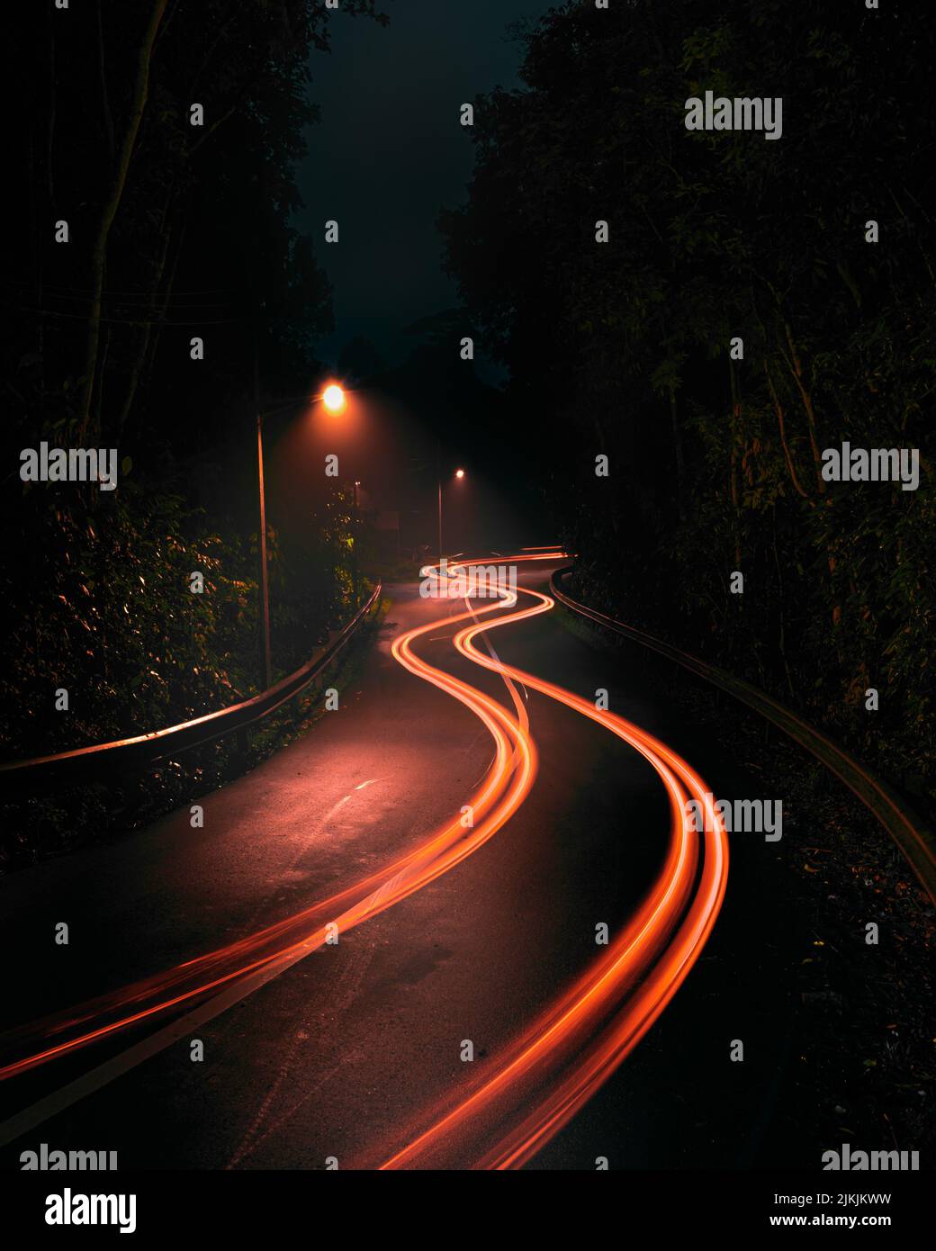 A night view of a traffic road with long exposure lights Stock Photo ...