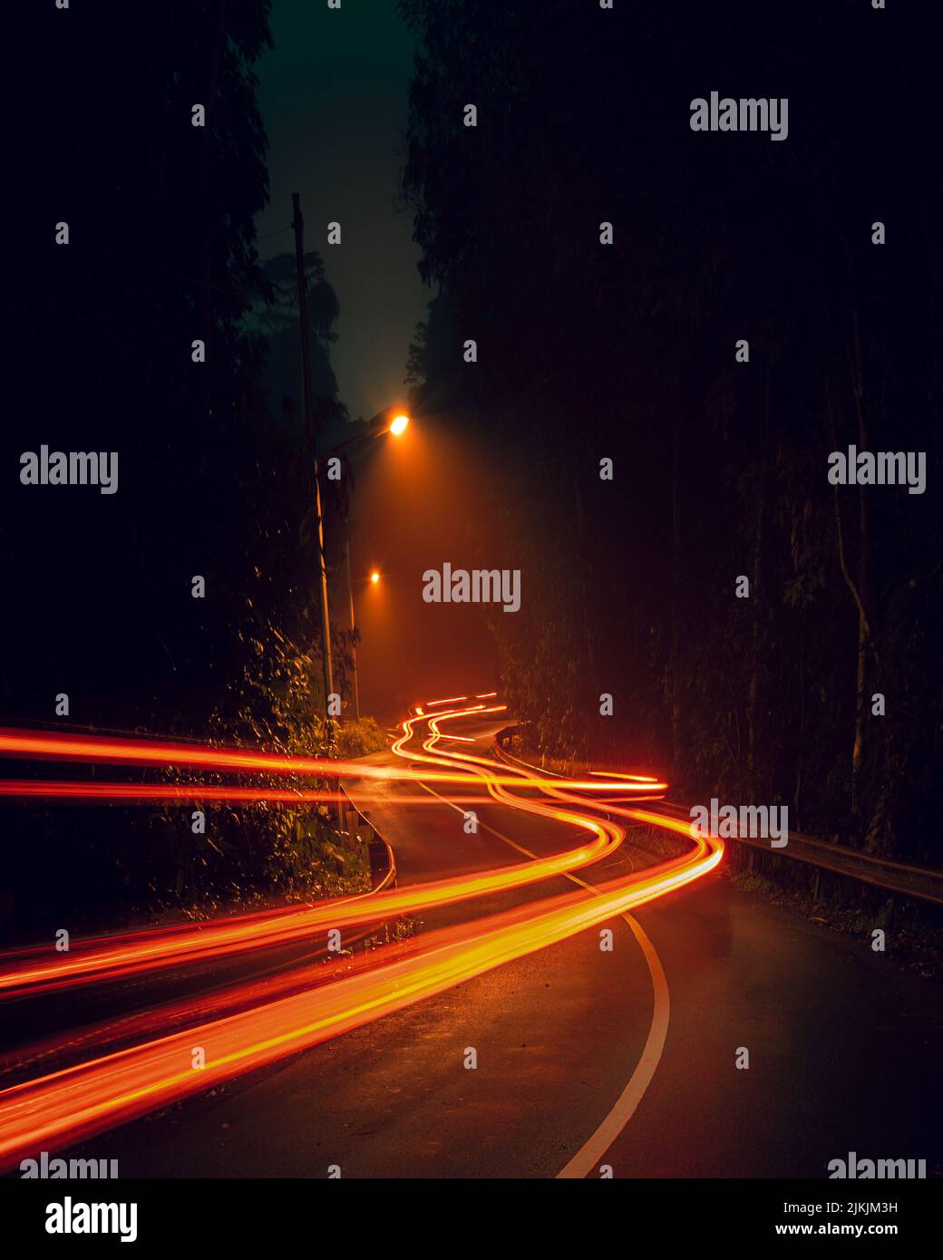A night view of a traffic road with long exposure lights Stock Photo ...