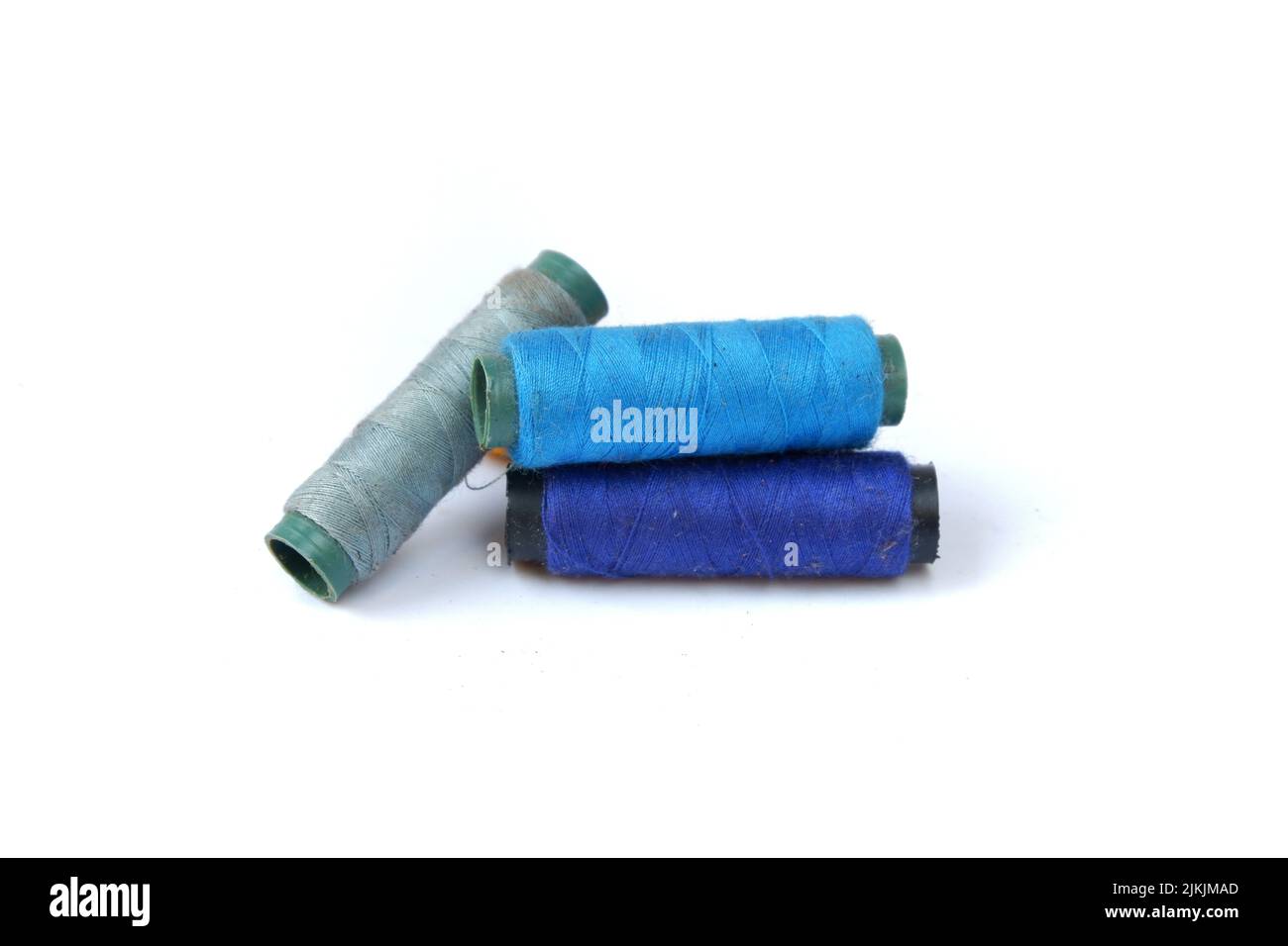 sewing thread isolated on a white background Stock Photo - Alamy