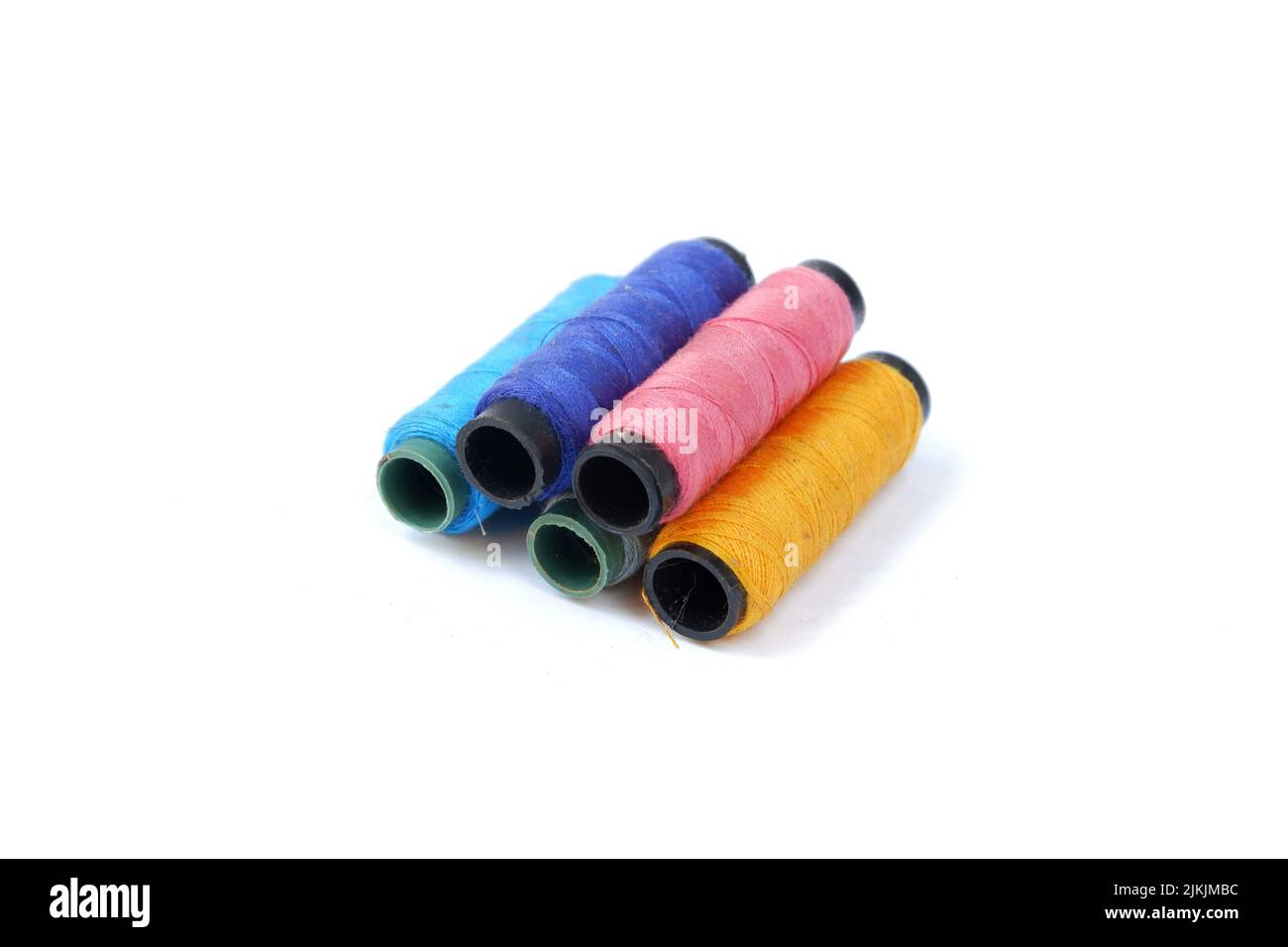sewing thread isolated on a white background Stock Photo - Alamy