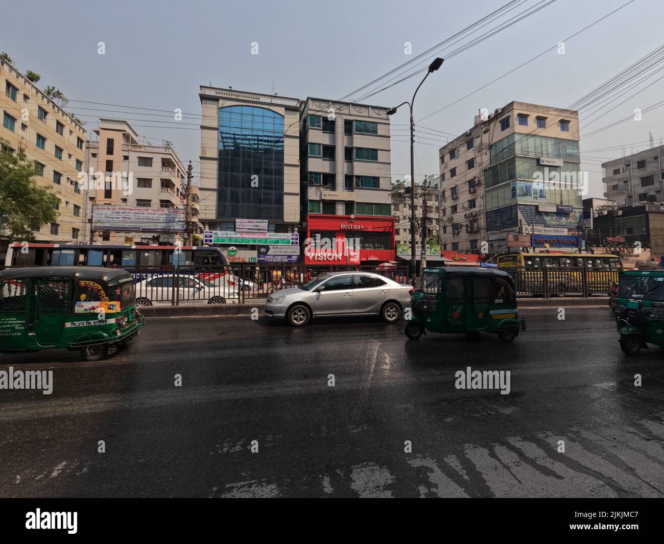 A beautiful shot of vehicles, Tok Tok and modern cars traffic in the ...