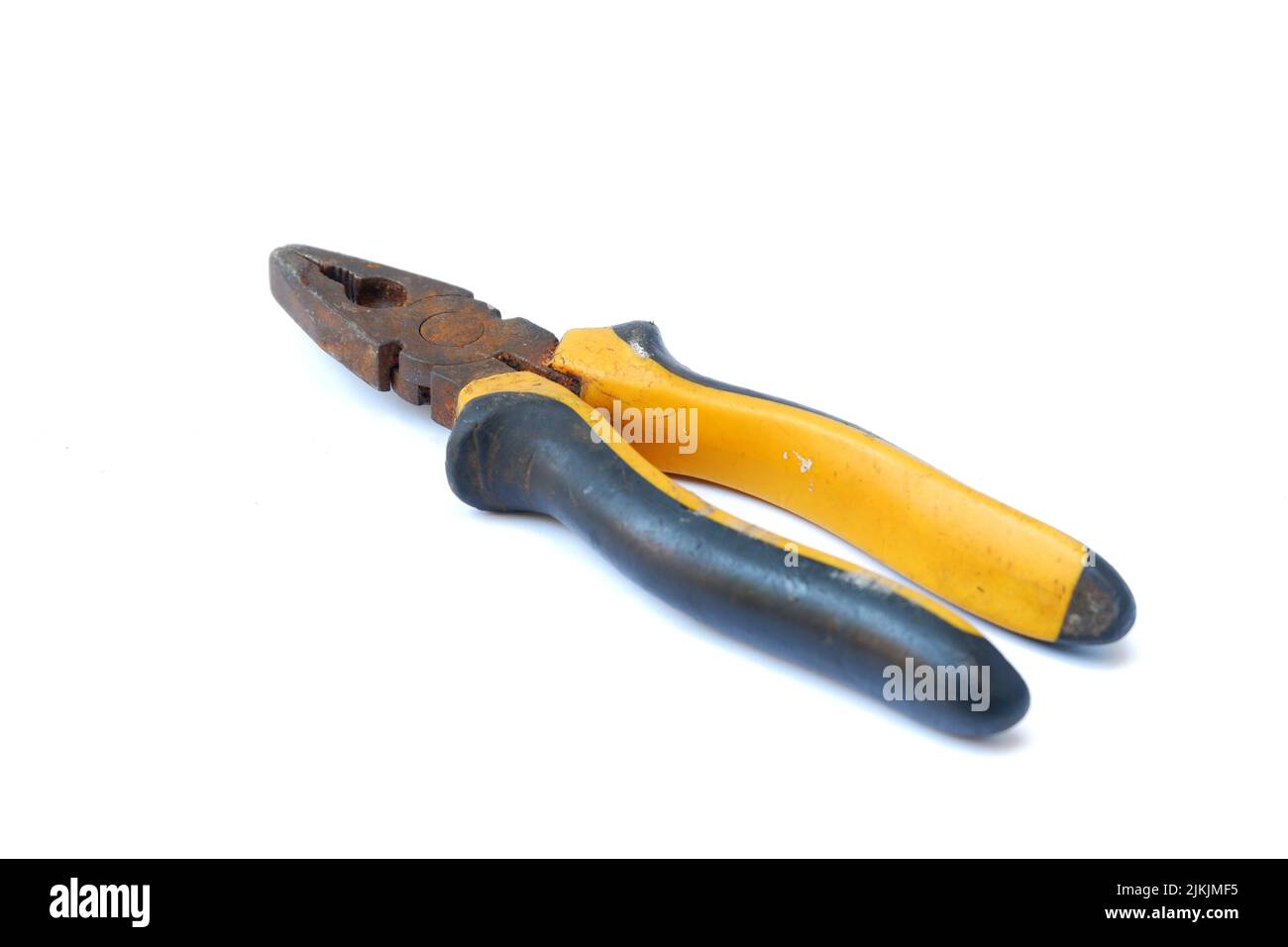 old pliers isolated on a white background Stock Photo - Alamy