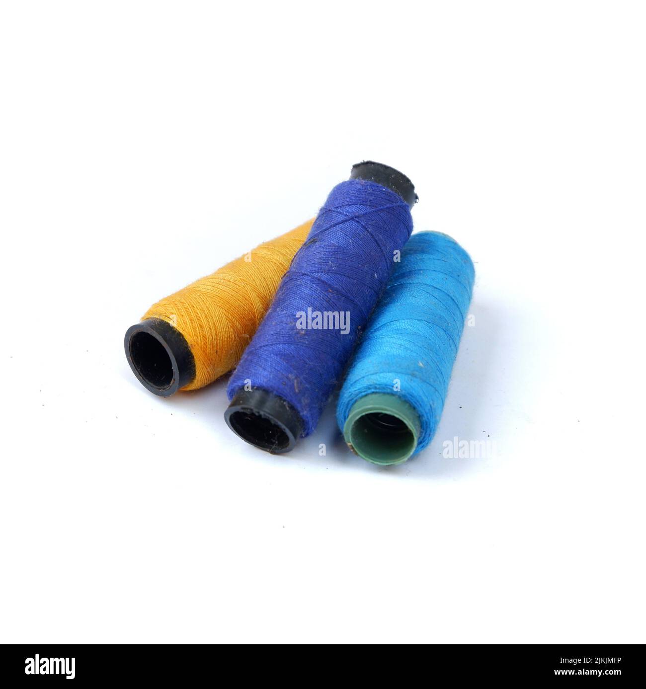 sewing thread isolated on a white background Stock Photo - Alamy