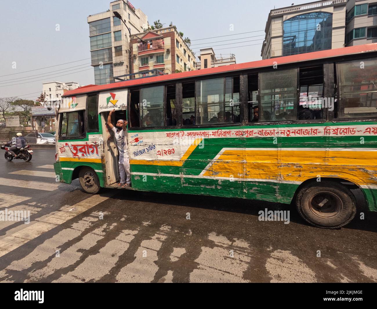 A beautiful shot of a big colorful old transport bus in the street in Dhaka, Bangladesh Stock ...