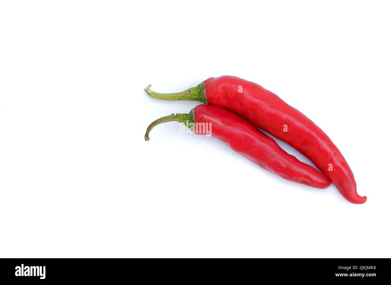 red chili isolated on a white background Stock Photo - Alamy