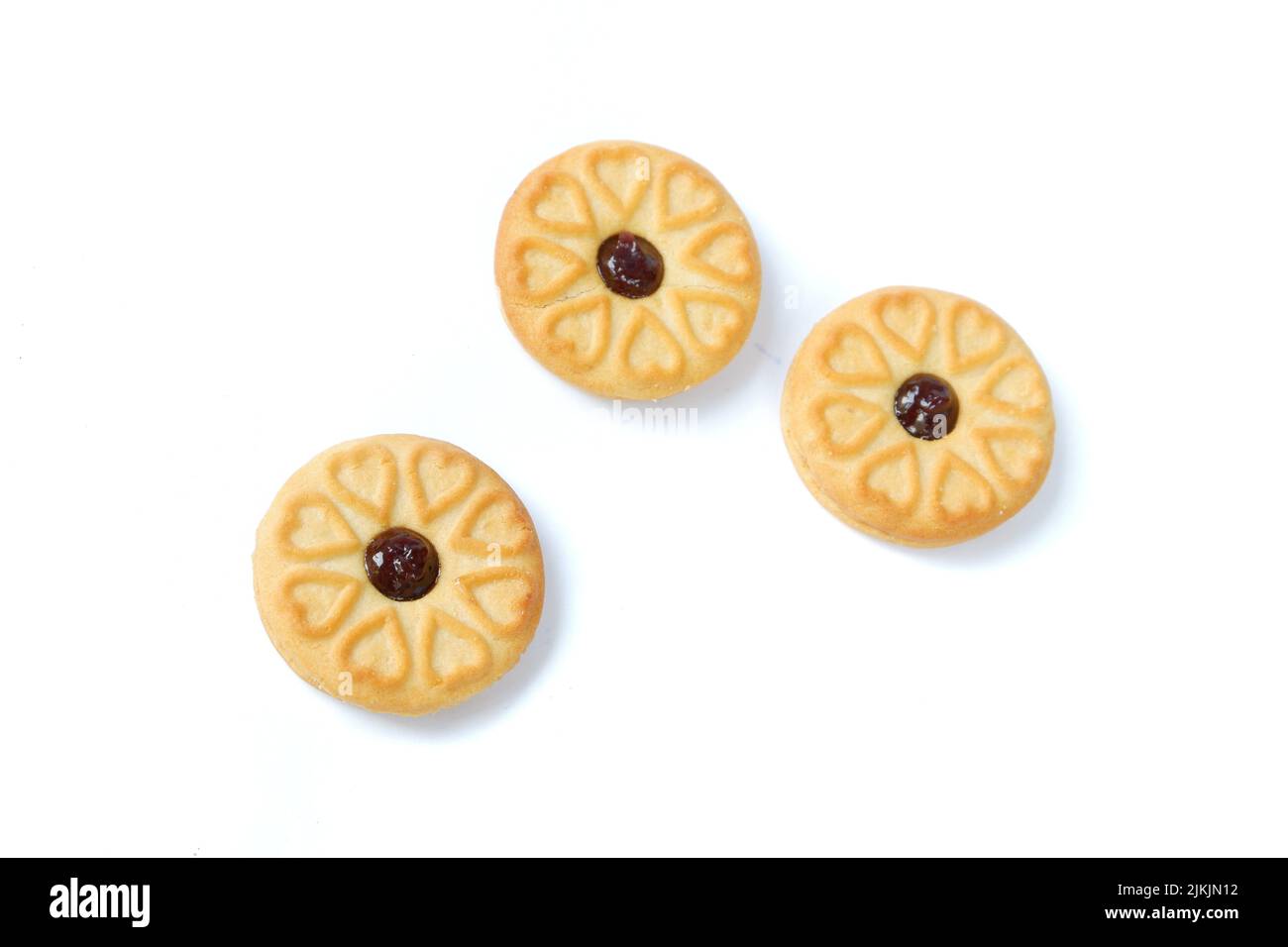 biscuits with blueberry jam on a white background Stock Photo - Alamy