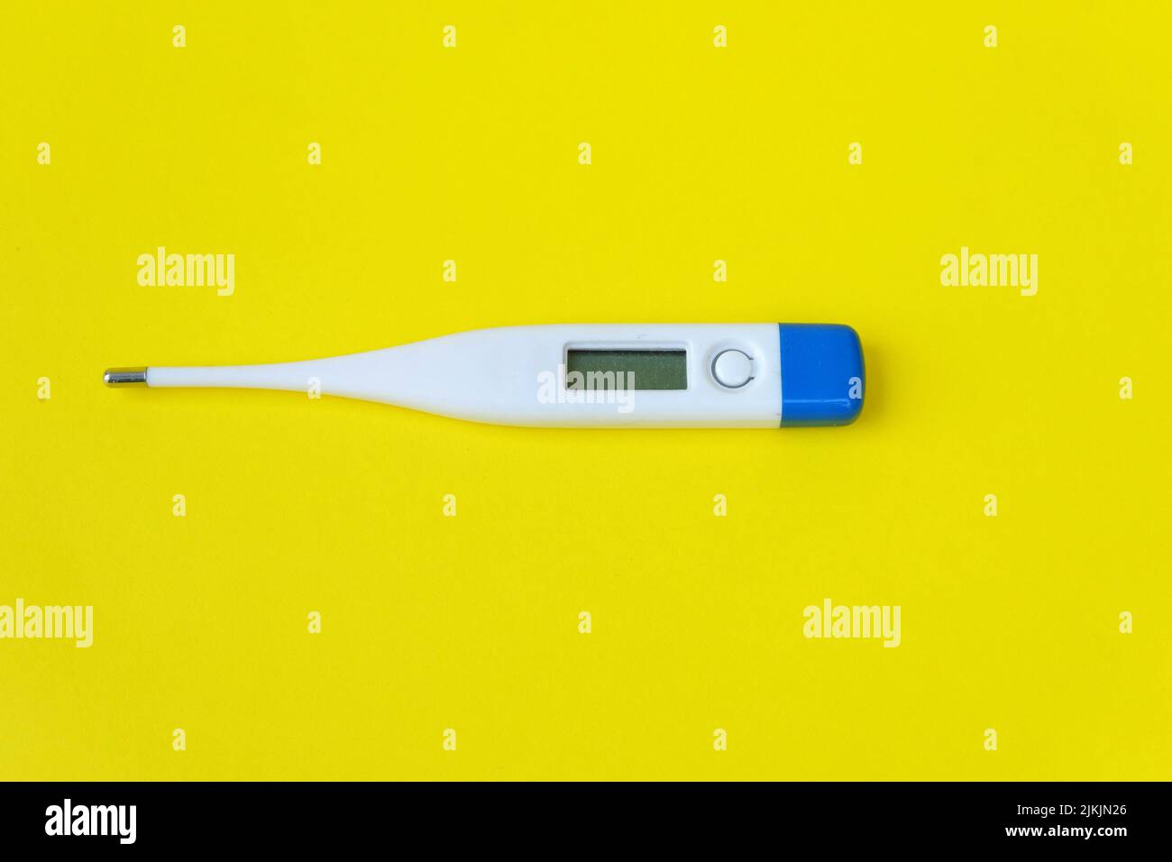 Thermometer on yellow background hi-res stock photography and images ...
