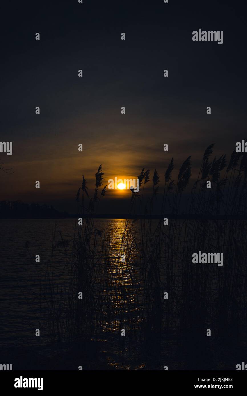 A scenic sunset at Lake Tegel connected to the River Havel in Berlin ...