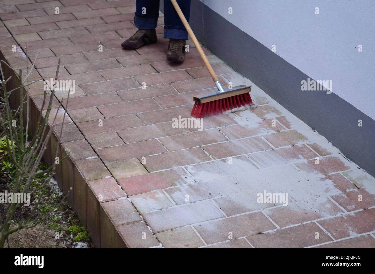Sweeping garbage hi-res stock photography and images - Alamy