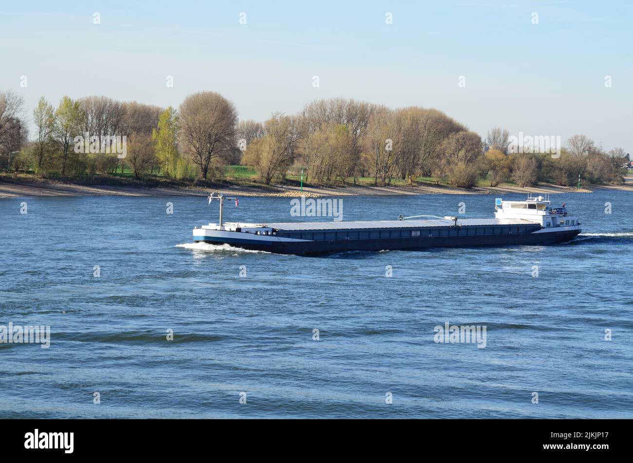 A river barge on the Rhine. Barges are designed for navigation on ...