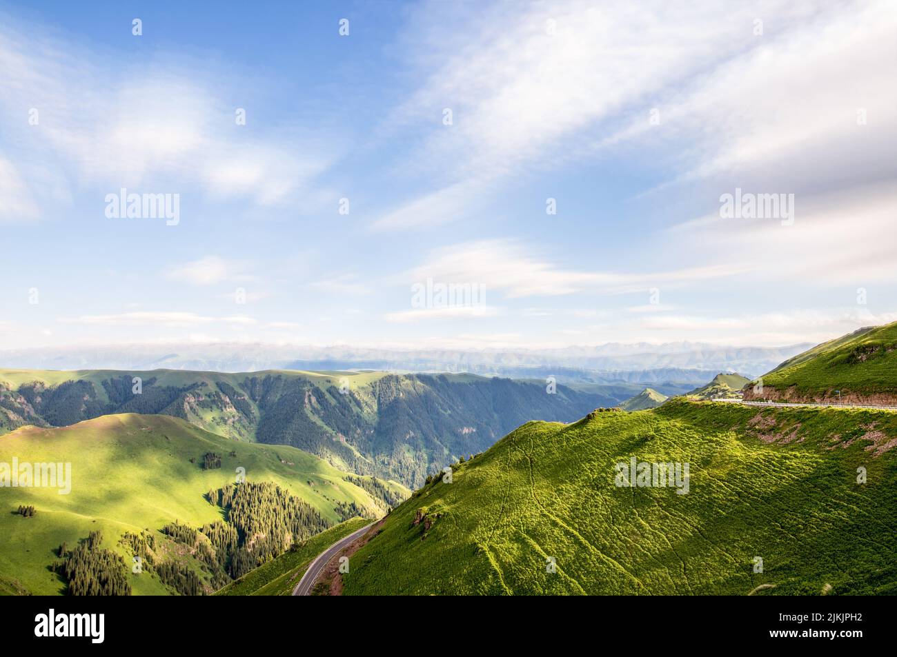 A mesmerizing view of a beautiful mountainous landscape in Xinjiang ...