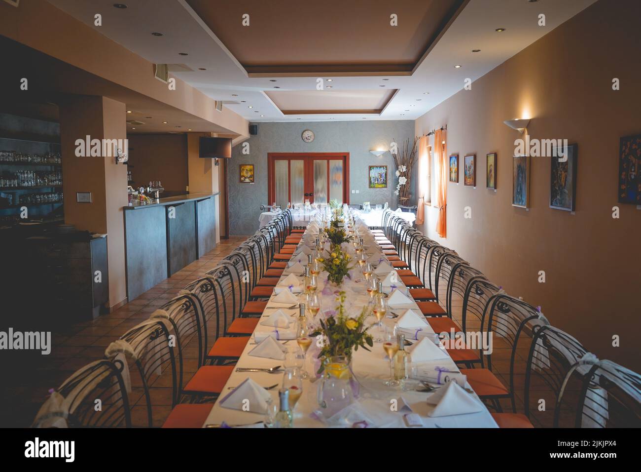 An empty elegantly decorated table at the wedding hall Stock Photo - Alamy