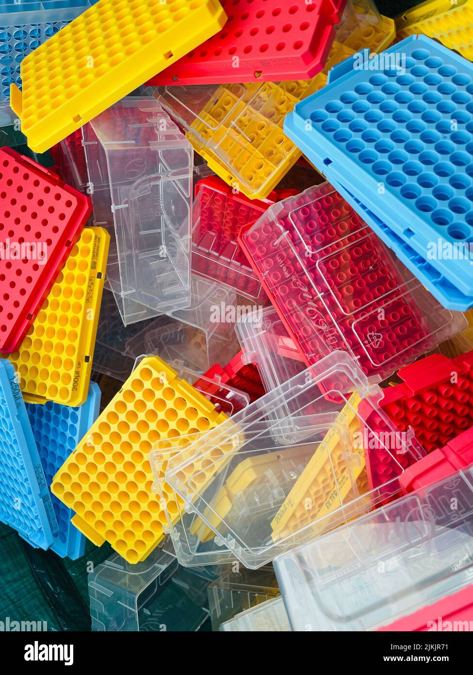 Red, yellow and blue polypropylene plastic waste Stock Photo - Alamy