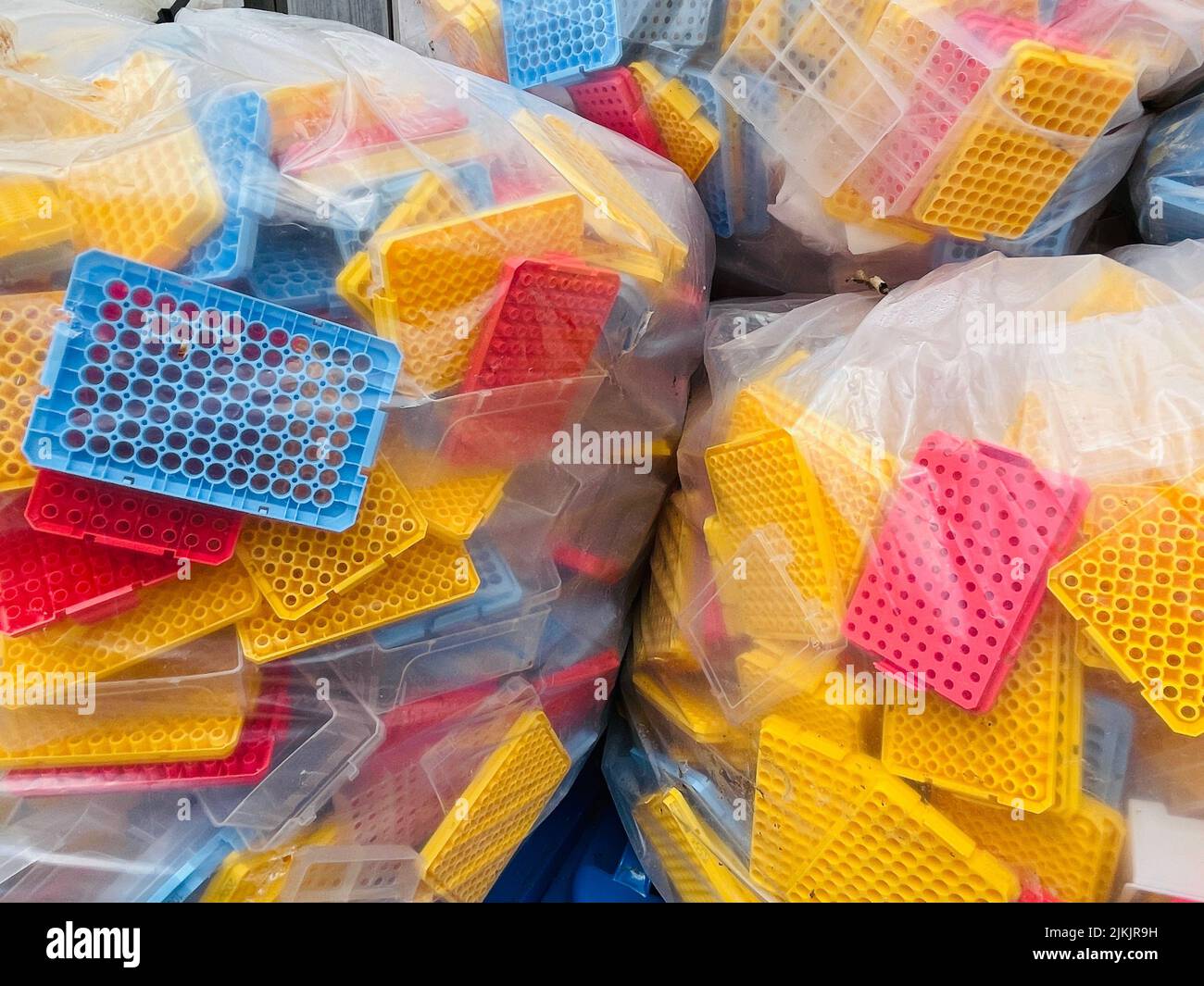 Red, yellow and blue polypropylene plastic waste Stock Photo - Alamy