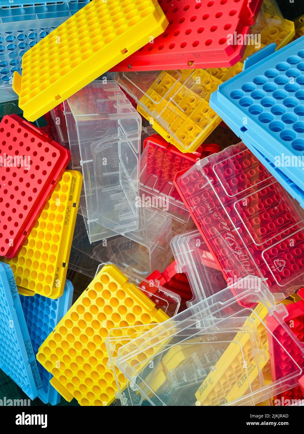 Red, yellow and blue polypropylene plastic waste Stock Photo - Alamy