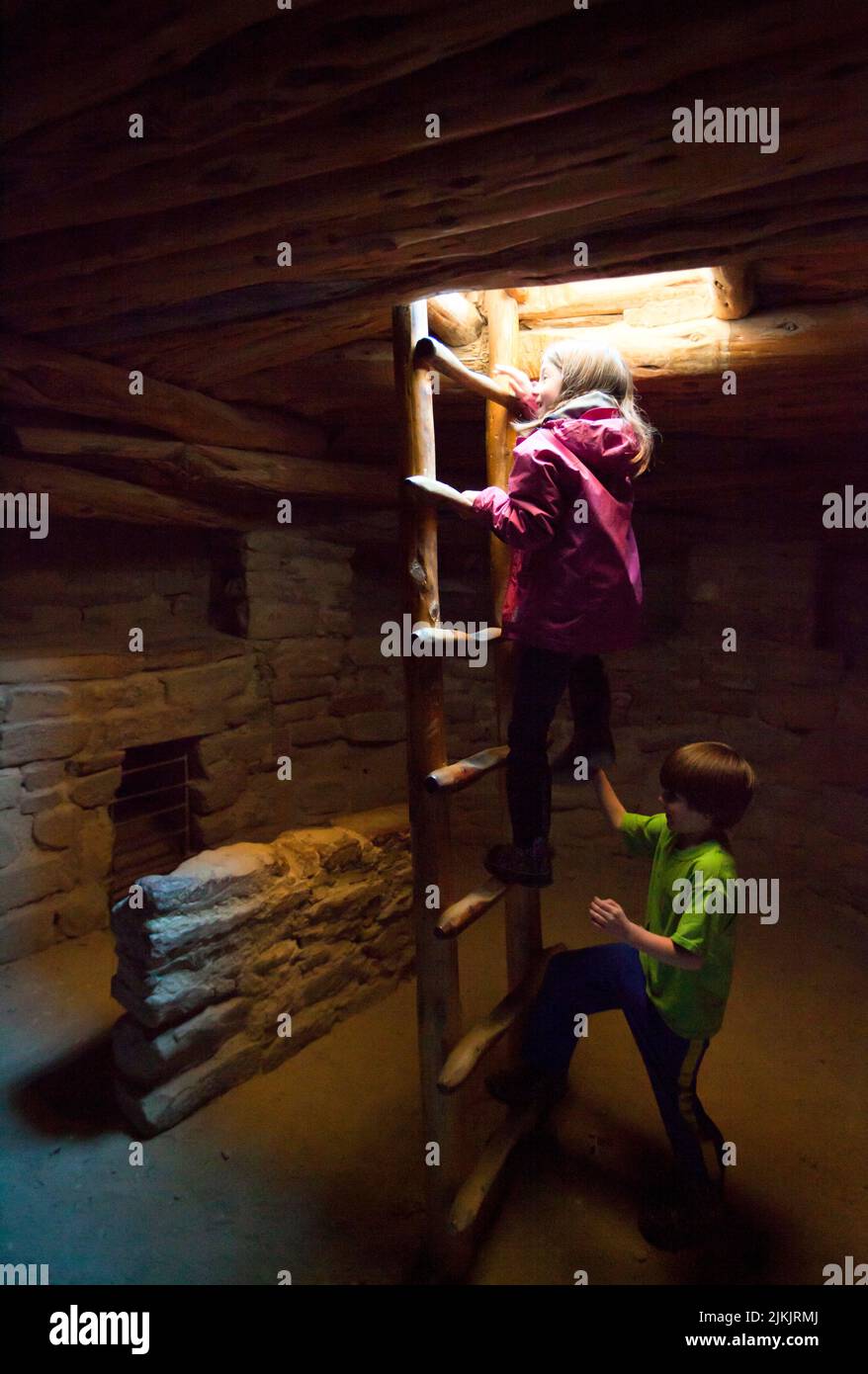 Two children visit Spruce Tree House ruins & climb down wooden ladder ...