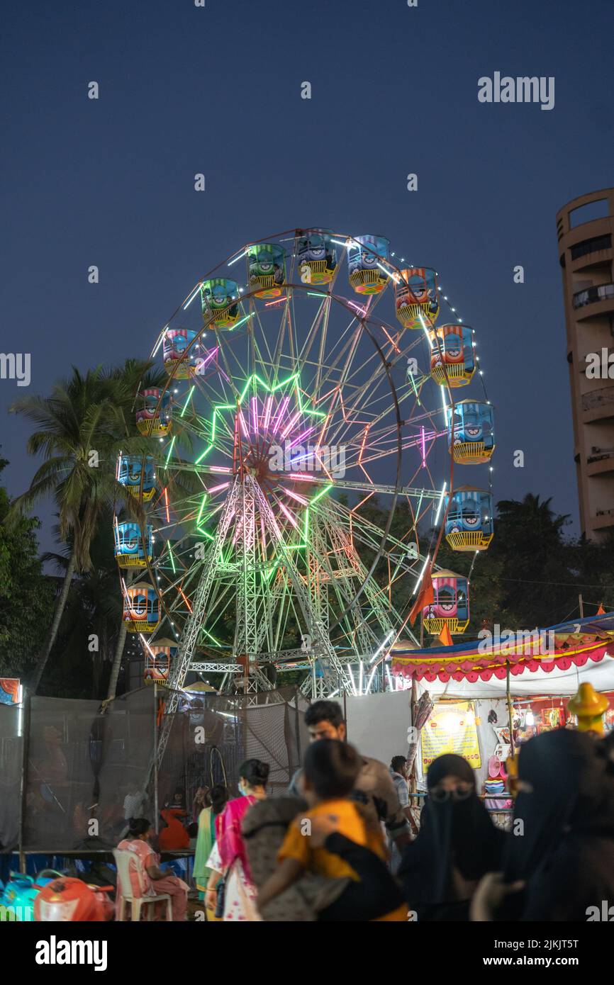 A Ferris wheel on a carnival festival in Mumbai Maharashtra Stock Photo ...