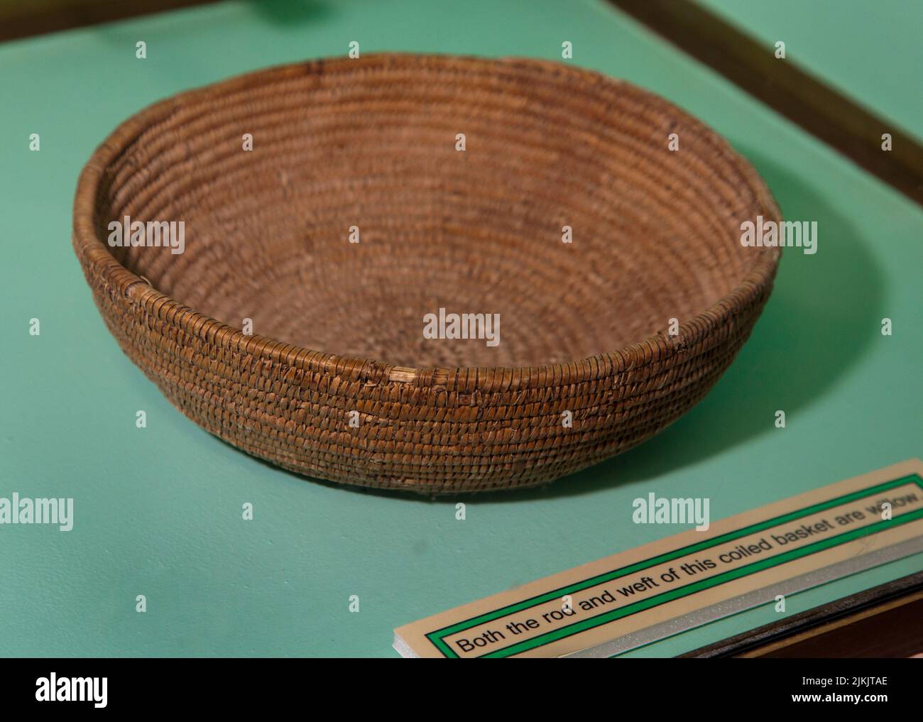 Basket weaving of an Anasazi coiled willow basket where both the rod ...