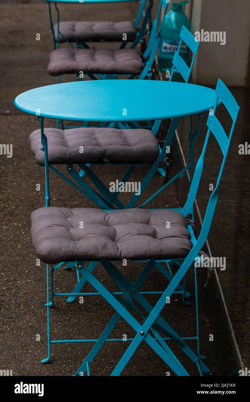 Blue empty restaurant table on sidewalk hi-res stock photography and ...