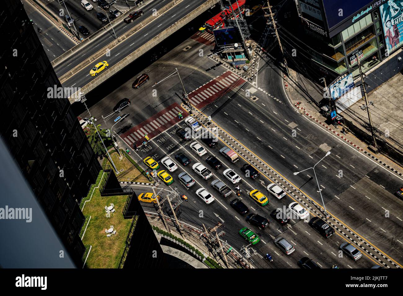 A bird's eye view of a busy intersection in downtown Bangkok, Thailand ...