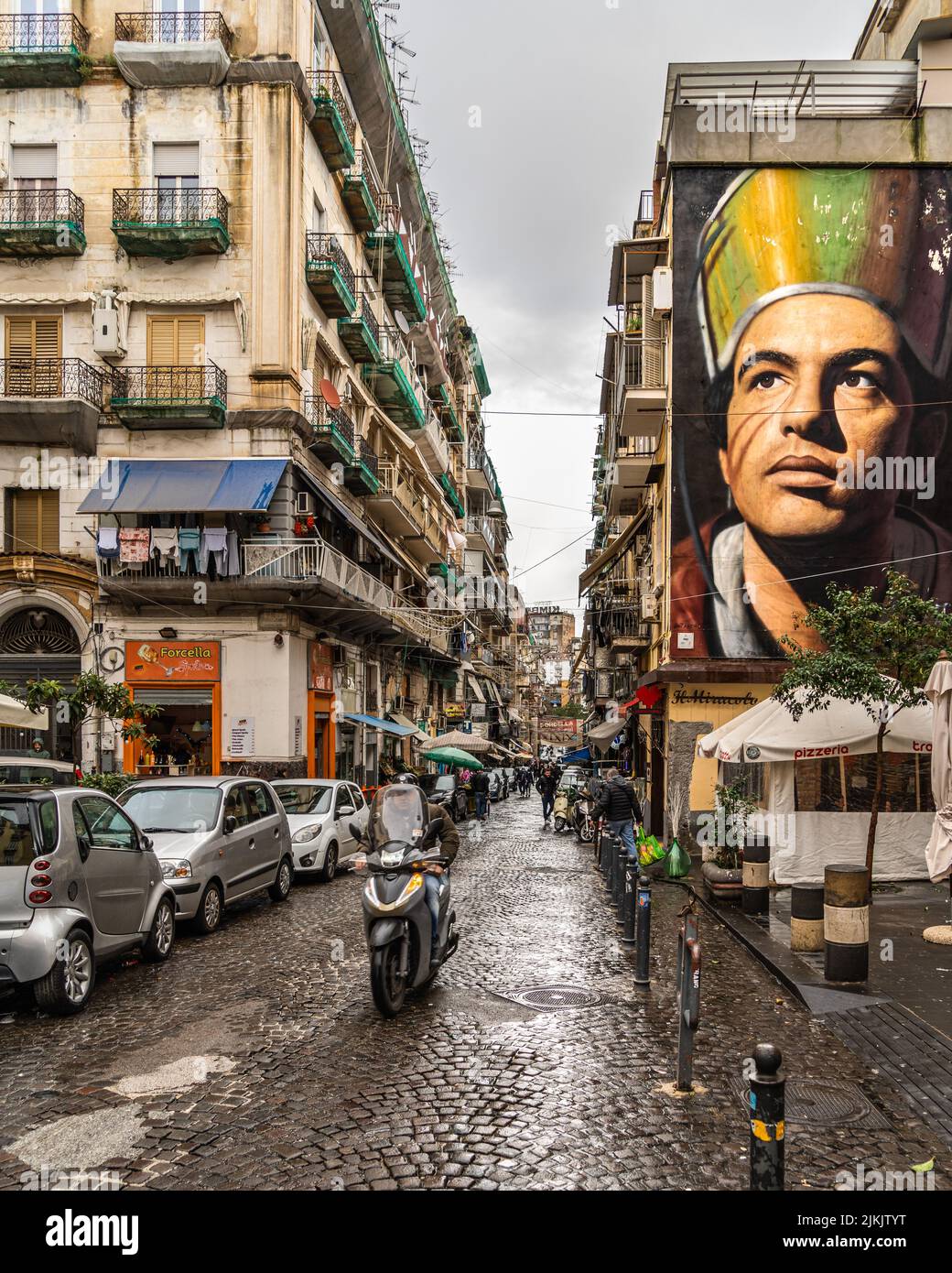 A Typical street in Forcella, neighborhood of Naples history center, Italy Stock Photo - Alamy
