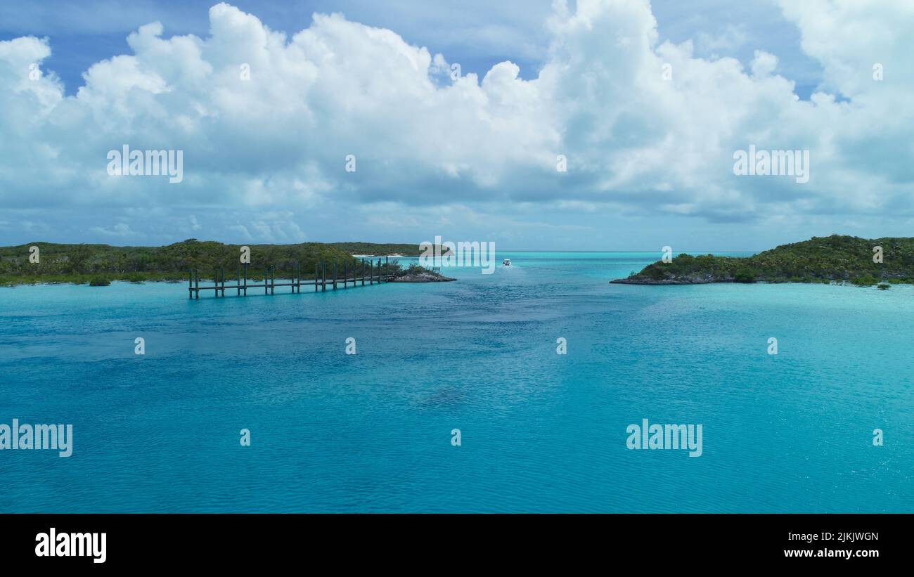 An aerial view of a dock near the shore at the Compass Cay island ...