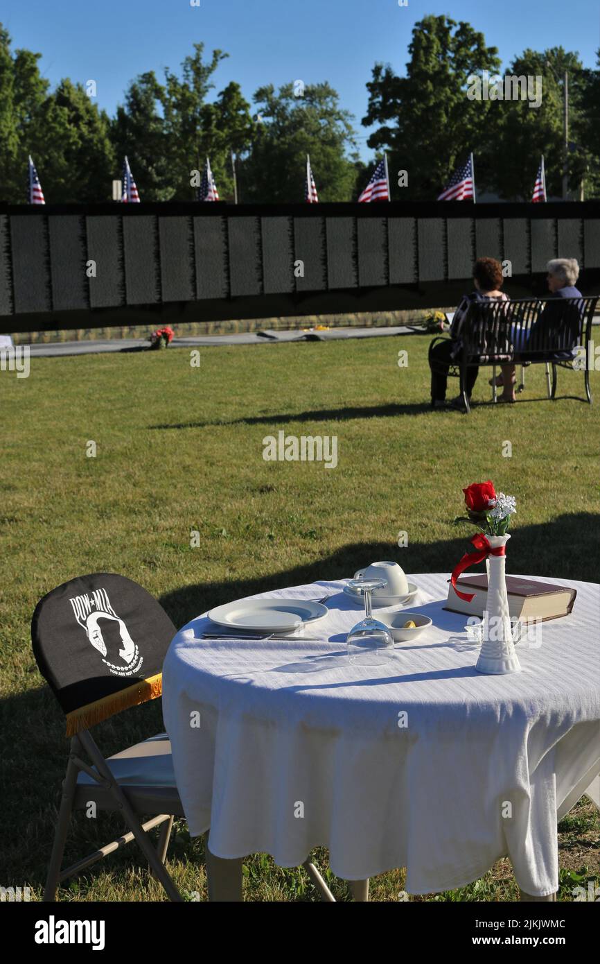 A vertical shot of the Vietnam Veterans Memorial Wall in Medina and two ...