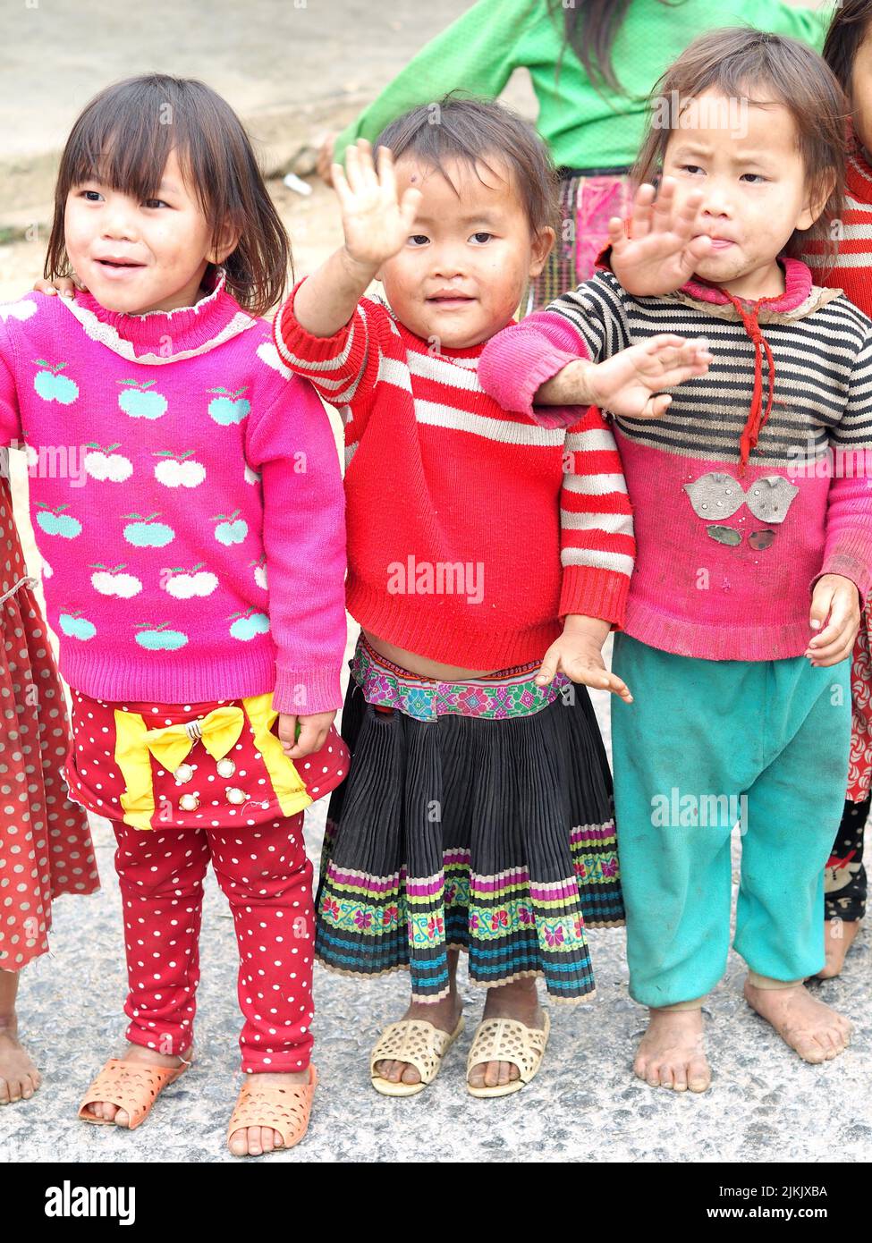 A group of little girls on the streets of Ha Giang in the North of ...