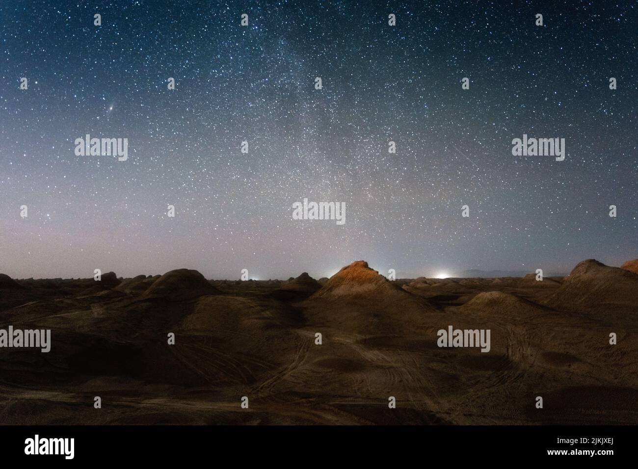 A scenic view of Milky Way Galaxy over the rocky desert Stock Photo - Alamy