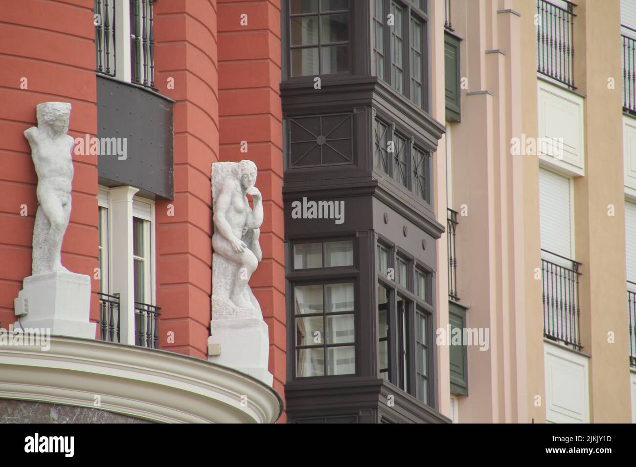 The details of sculptures on the facade of a building in Bilbao, Spain ...