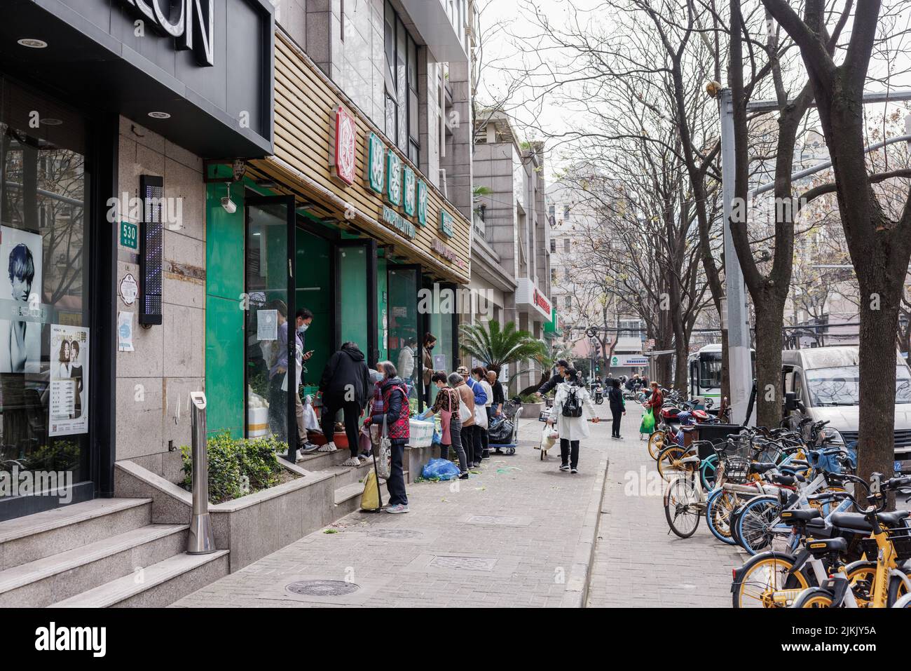 A group of people in a supermarket shopping for essentials in preparation for the lockdown ...